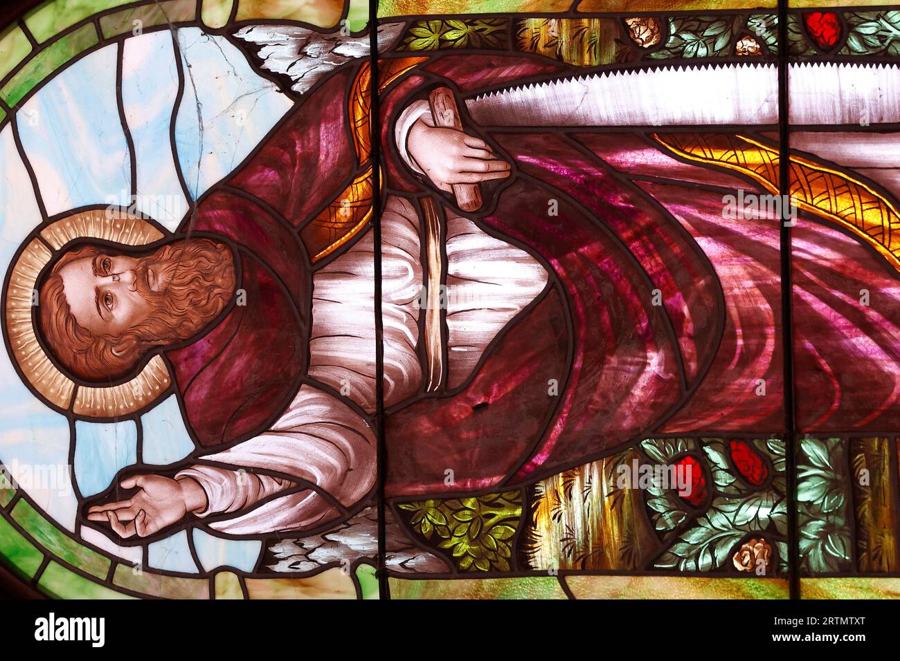 Catholic church. Stained glass window. Simon the Canaanean or Simon the ...