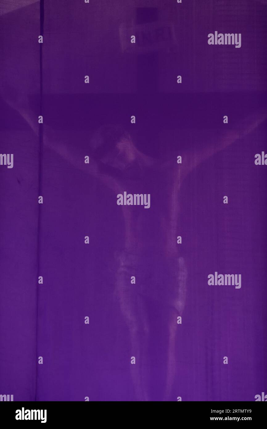 Lent and Holy Week. Sacred image covered with purple fabric. Religious ...