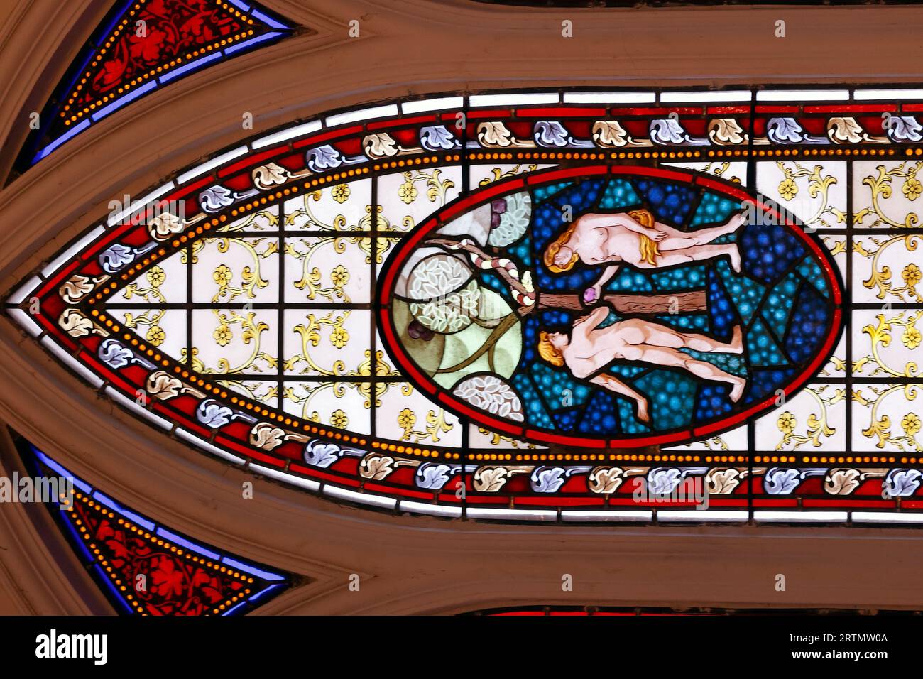 Thi Nghe catholic Church. Stained glass window. Adam and Eve in the Garden of Eden. Ho Chi Minh ...