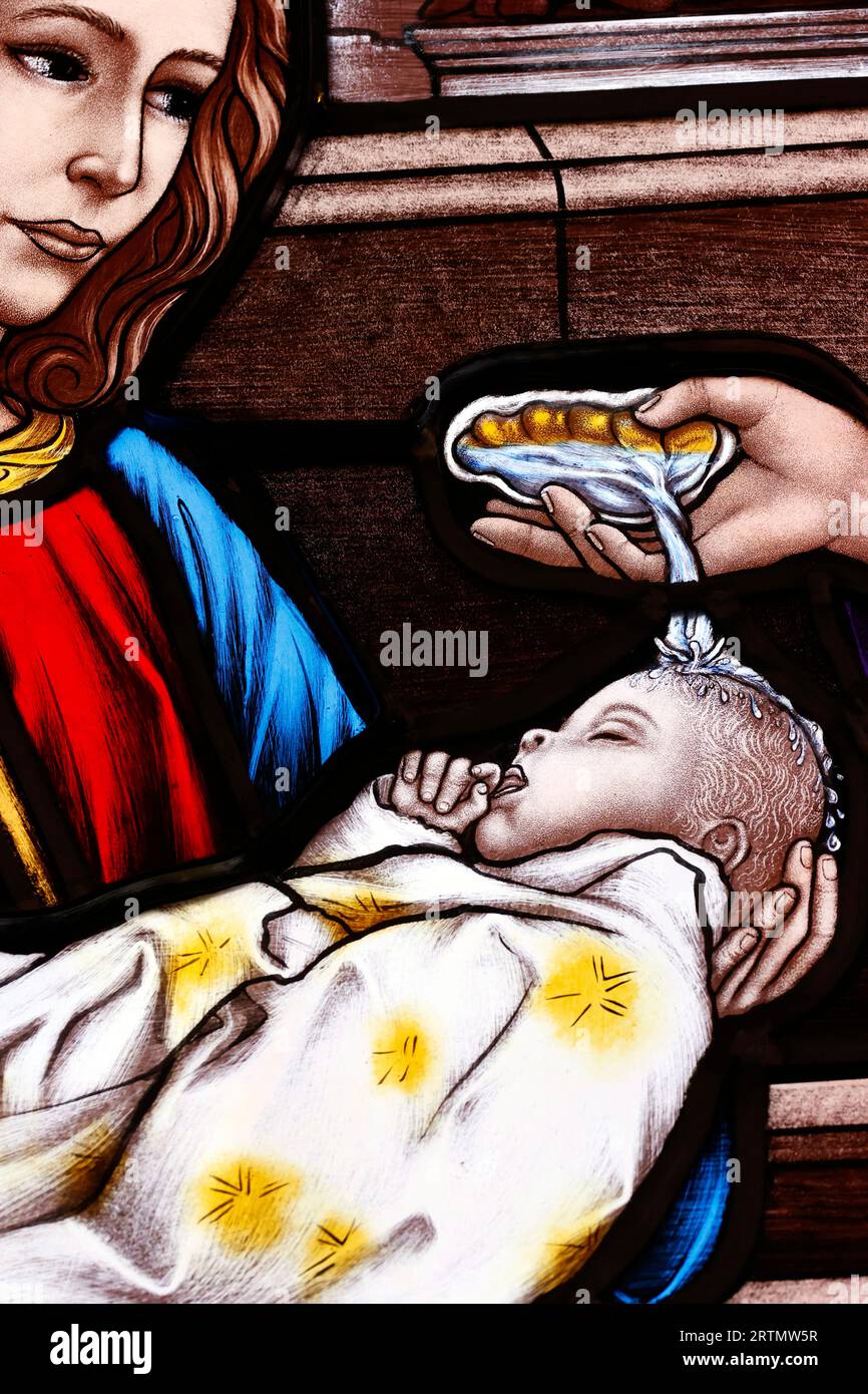 Song Vinh catholic church. Stained glass window. Baptism of a child by ...