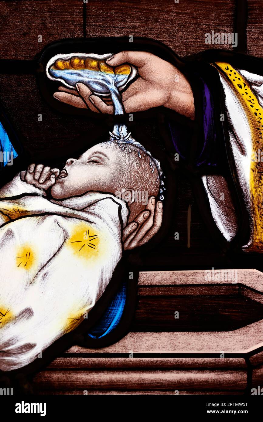 Song Vinh catholic church. Stained glass window. Baptism of a child by ...