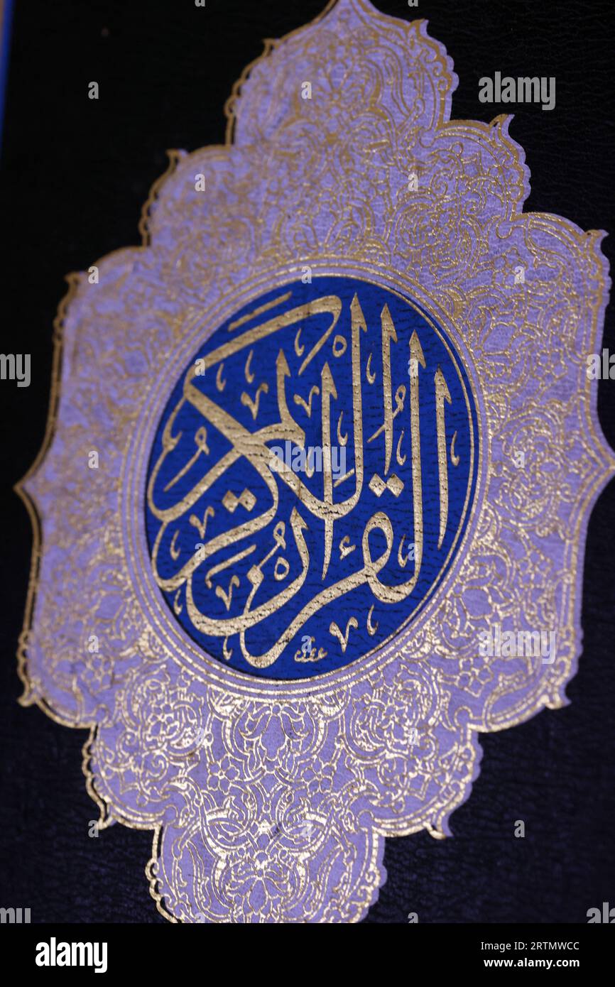 Cover of the Holy Quran book. Calligraphy. Vietnam Stock Photo - Alamy