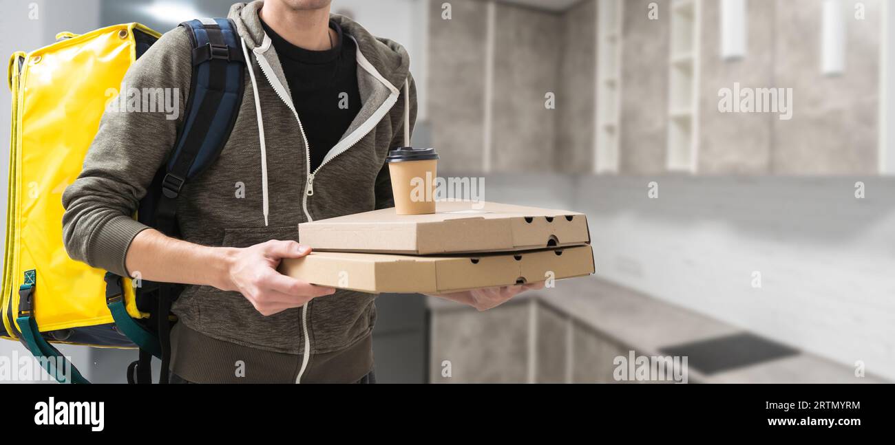 Delivery employee man hold thermal bag backpack with food work as ...