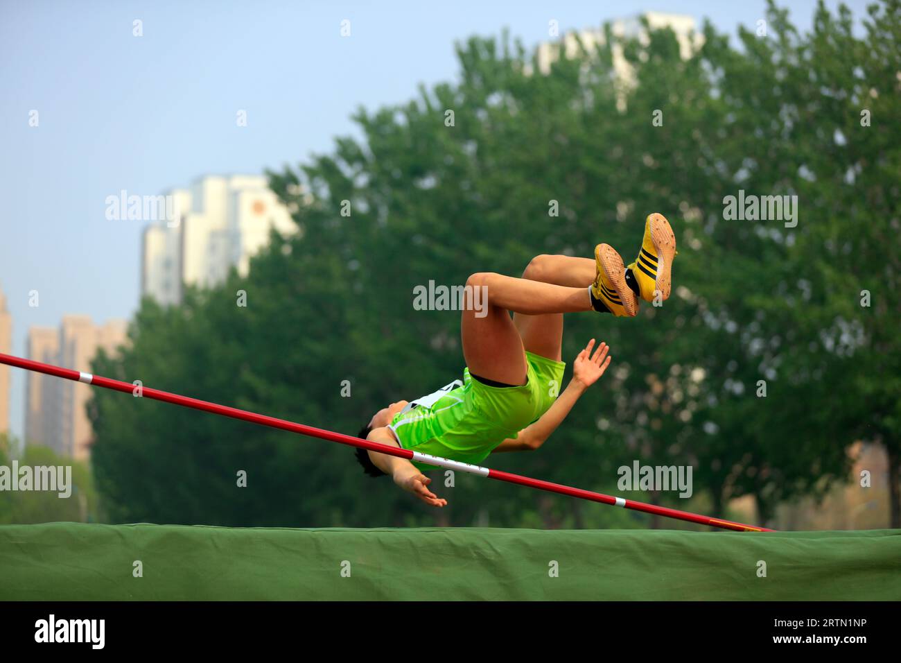 High jumpers at the scene of the game Stock Photo - Alamy