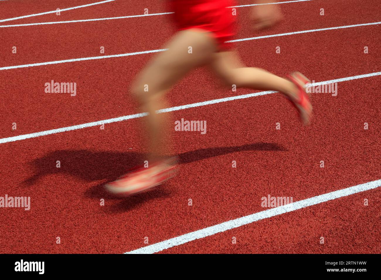 legs of a long distance runne Stock Photo - Alamy