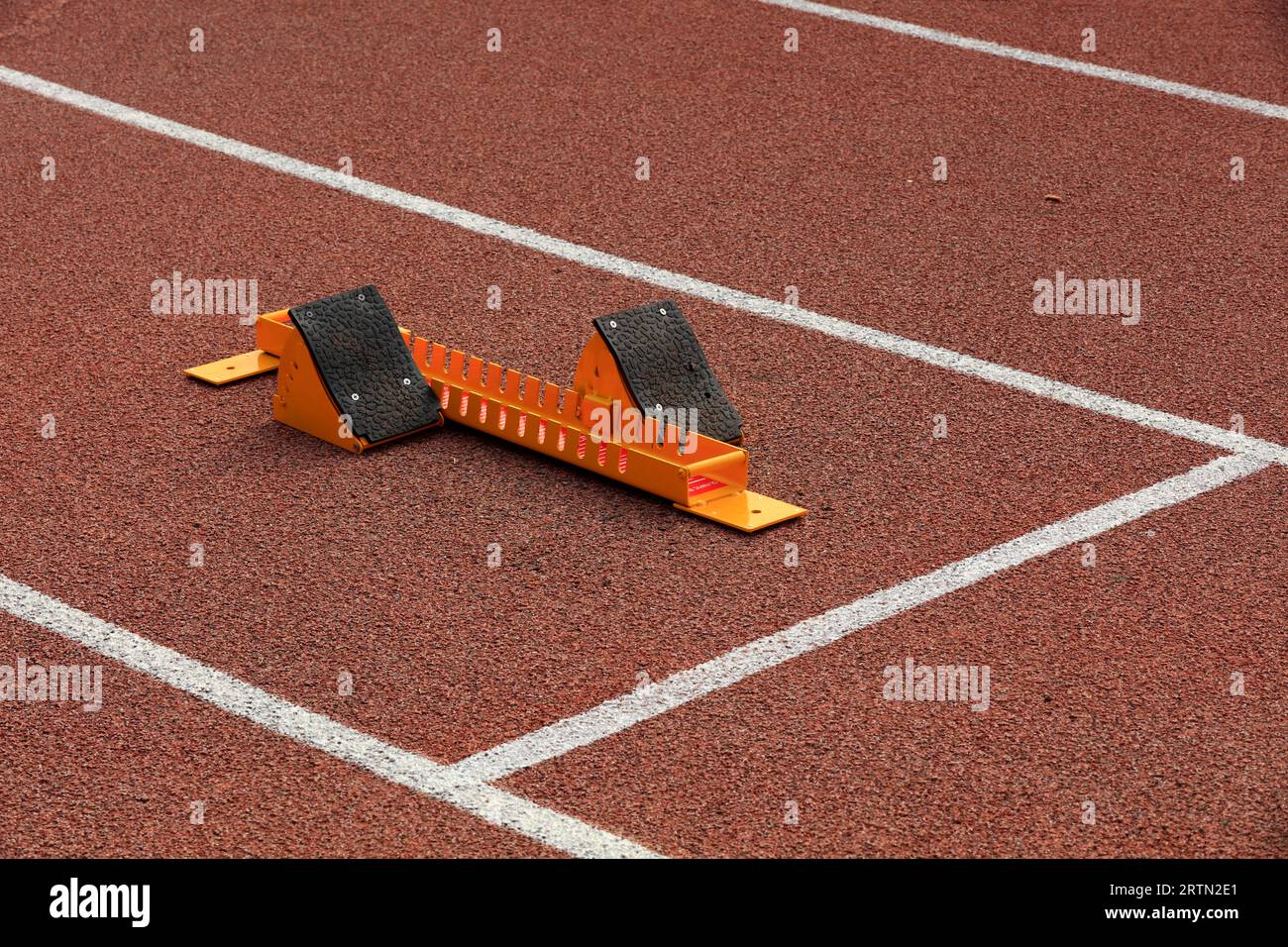 starting frame on the plastic runway Stock Photo - Alamy