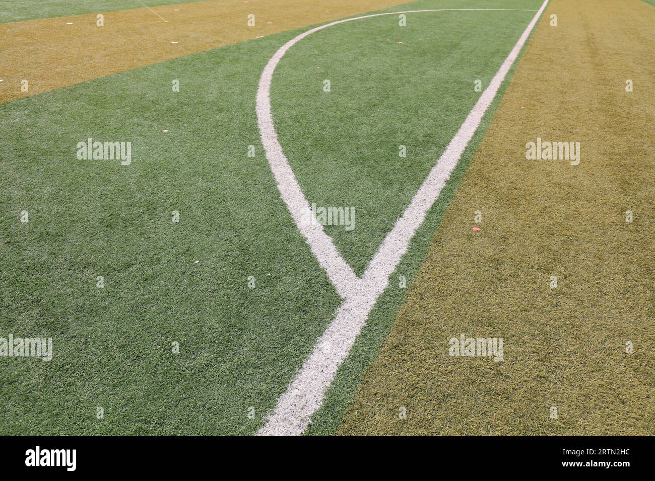 white curve on the green plastic playground Stock Photo - Alamy