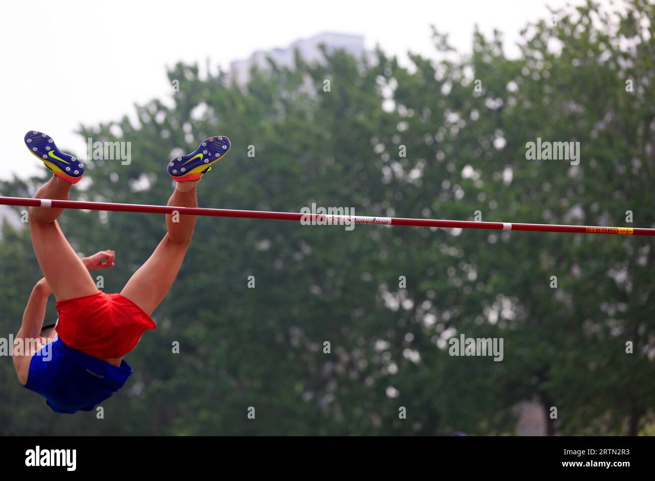 High jumpers at the scene of the game Stock Photo - Alamy