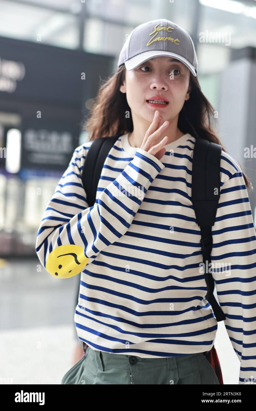 Chinese actress and singer Song Jia appears at the airport in Shanghai ...