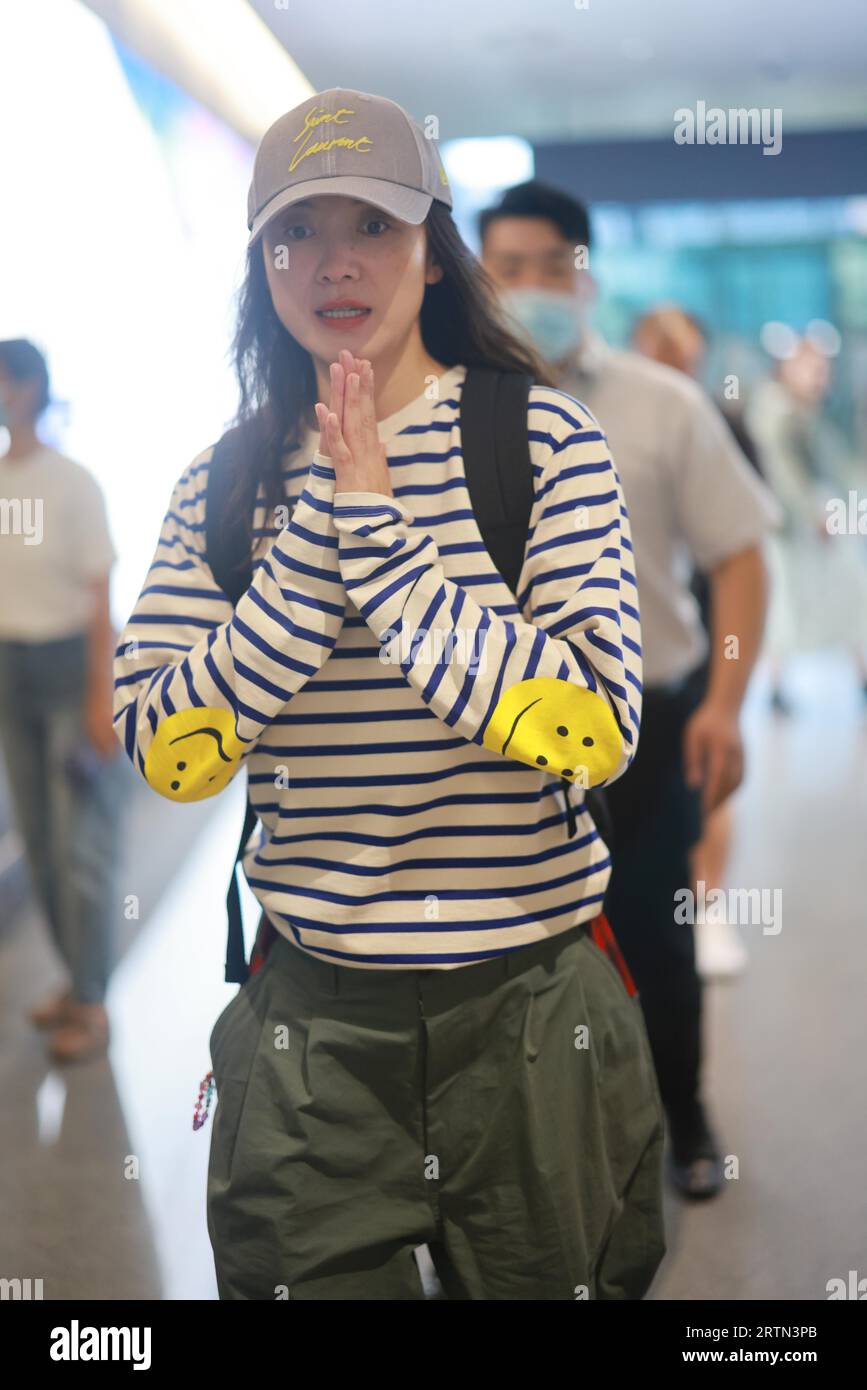 Chinese actress and singer Song Jia appears at the airport in Shanghai ...