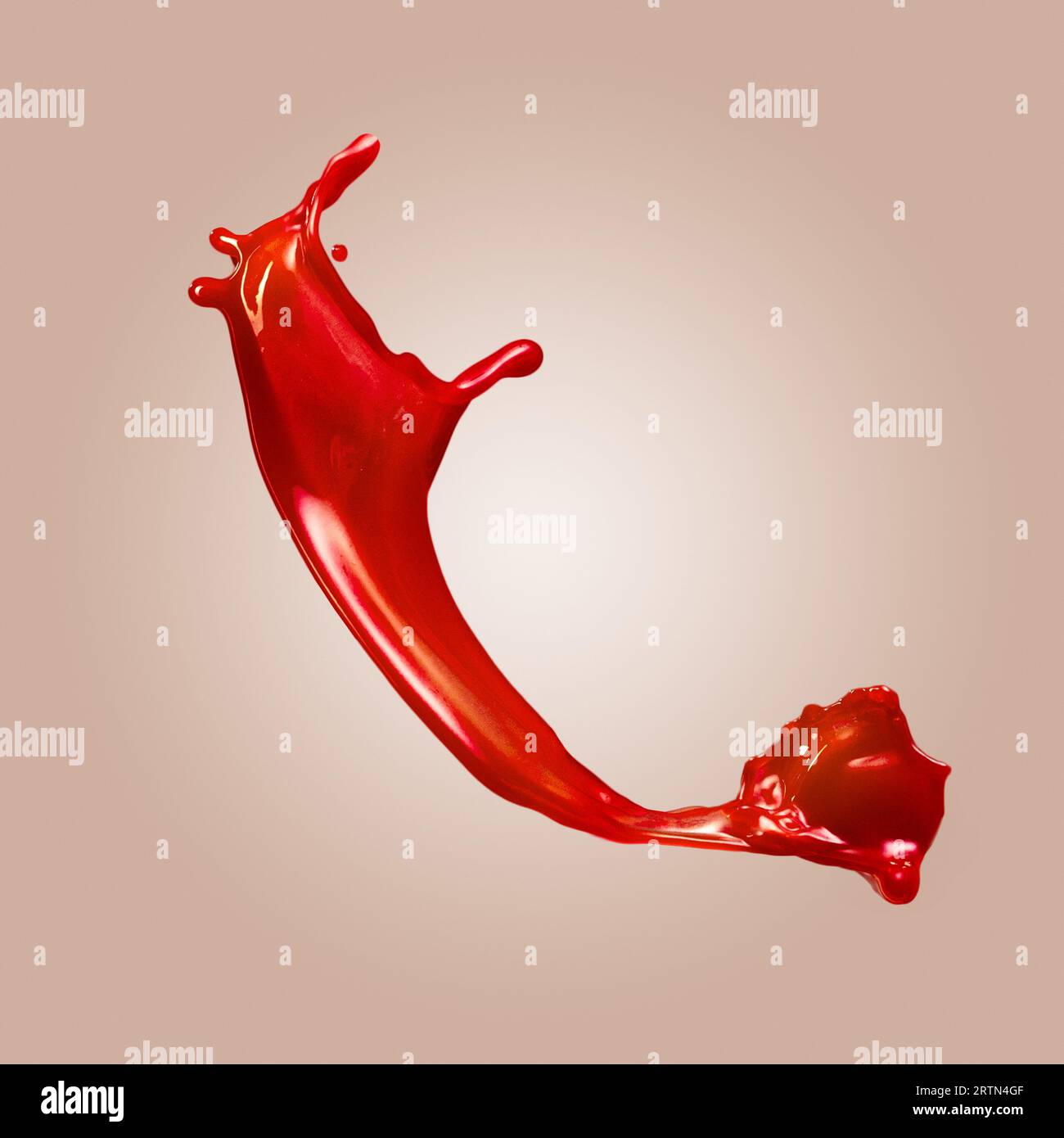 Levitating red splash isolated on gradient brown background. Liquid ...