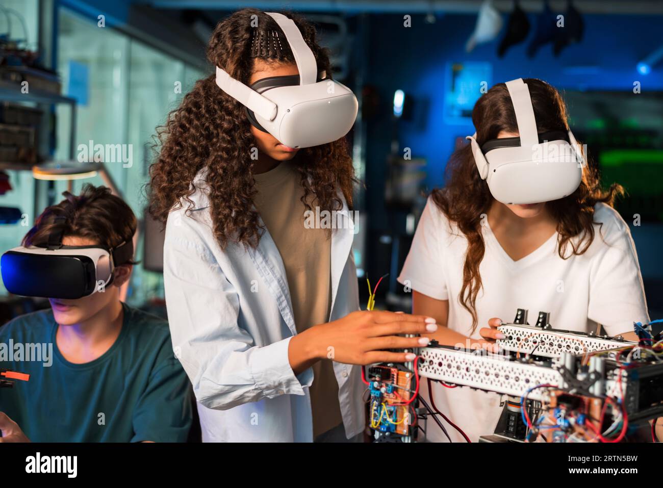 Group young people doing experiments hi-res stock photography and ...