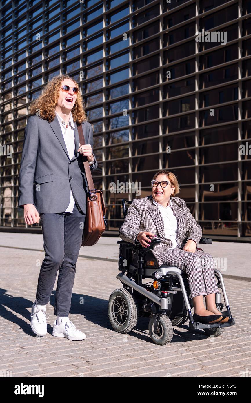 Business partners laughing walking hi-res stock photography and images ...