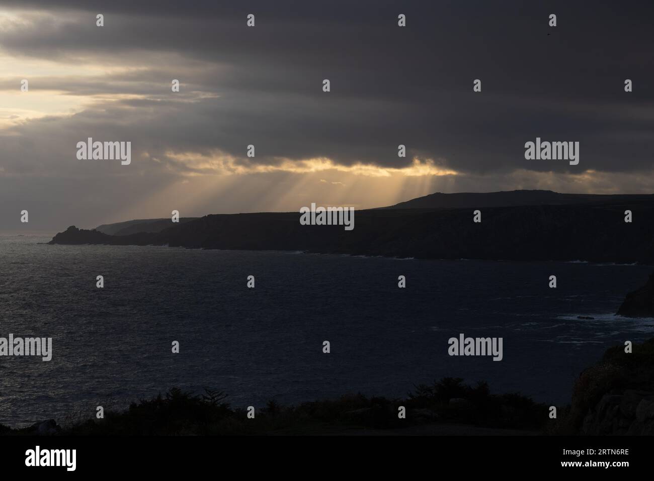 Pendeen Head view to Gurnard's Head Cornwall sun rays at dawn August ...