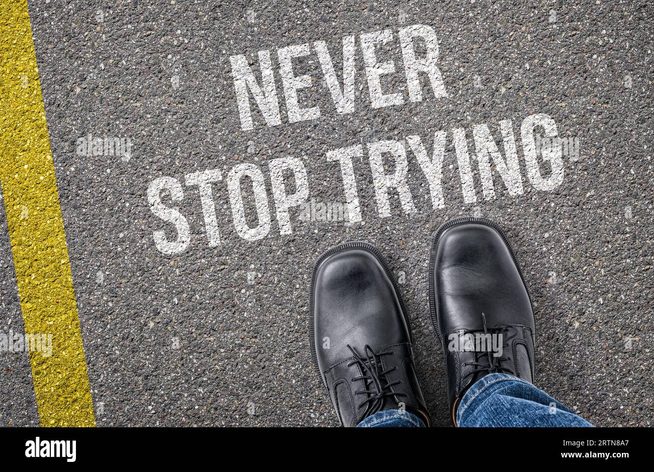 Text on road never hi-res stock photography and images - Alamy