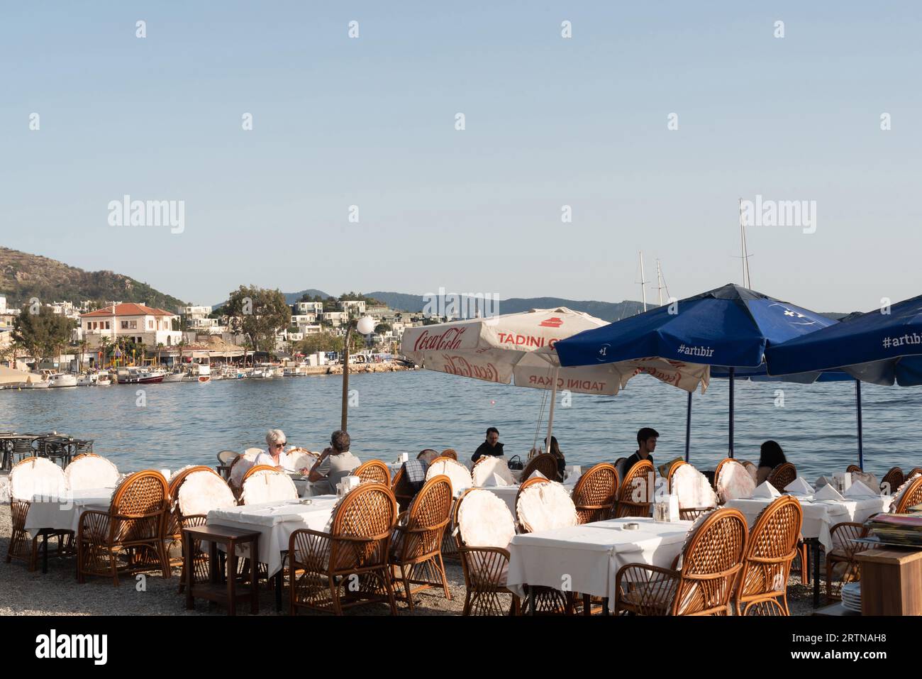 Turkish restaurant on the beach of Bodrum harbour, a popular tourist ...