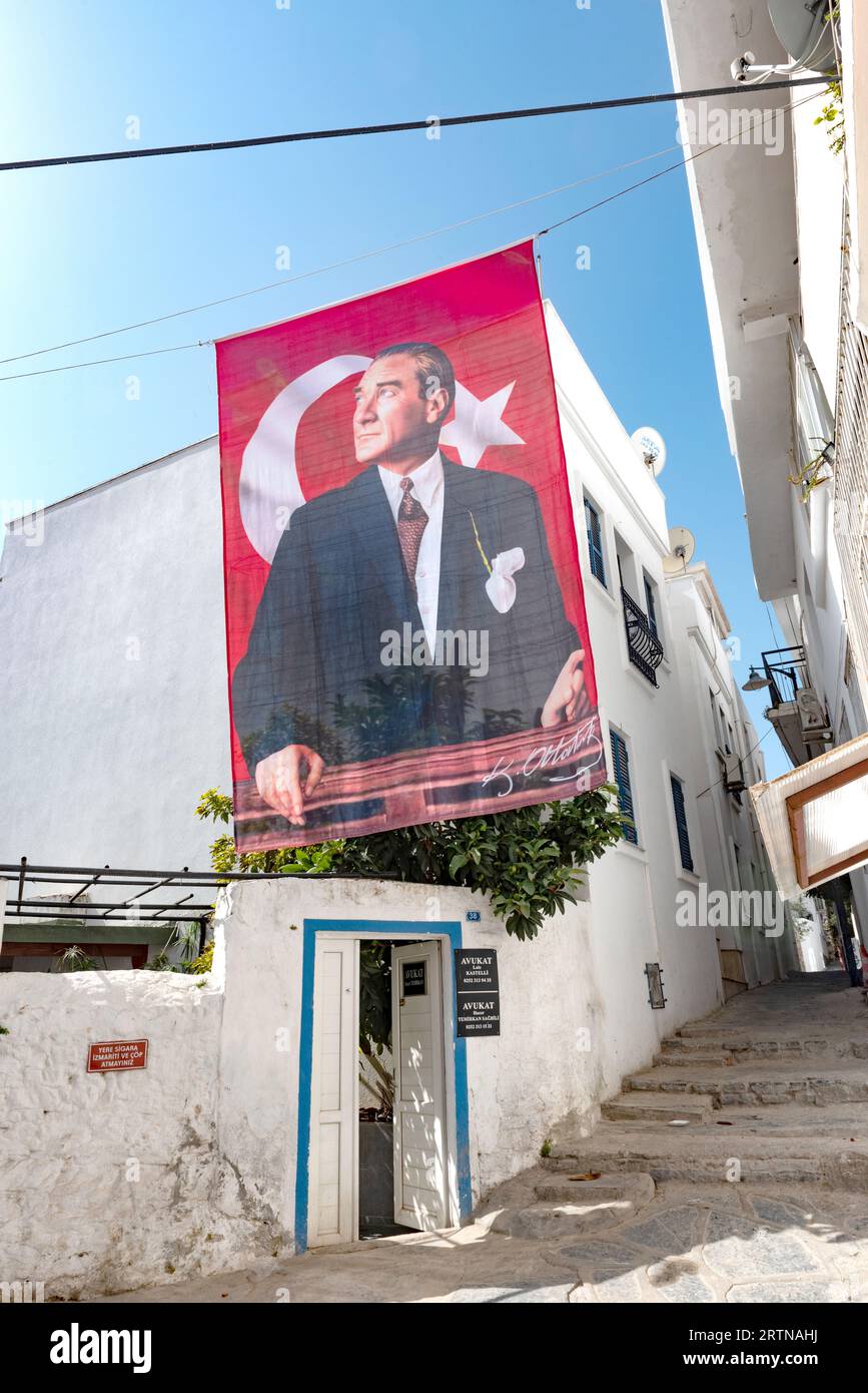 A pretty street with traditional local architecture and portrait of ...