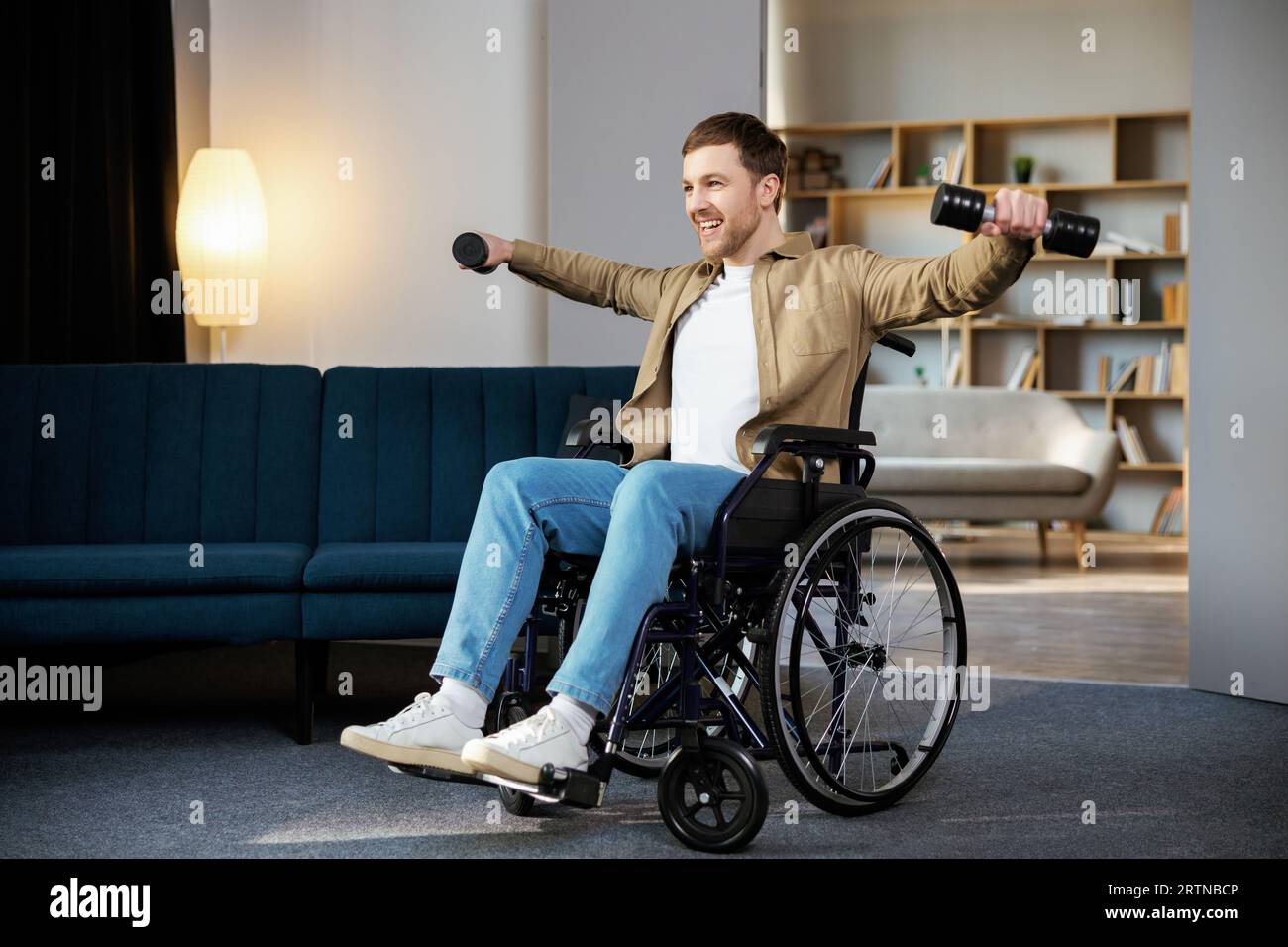 Physical rehabilitation for disabled people. Happy guy in wheelchair ...