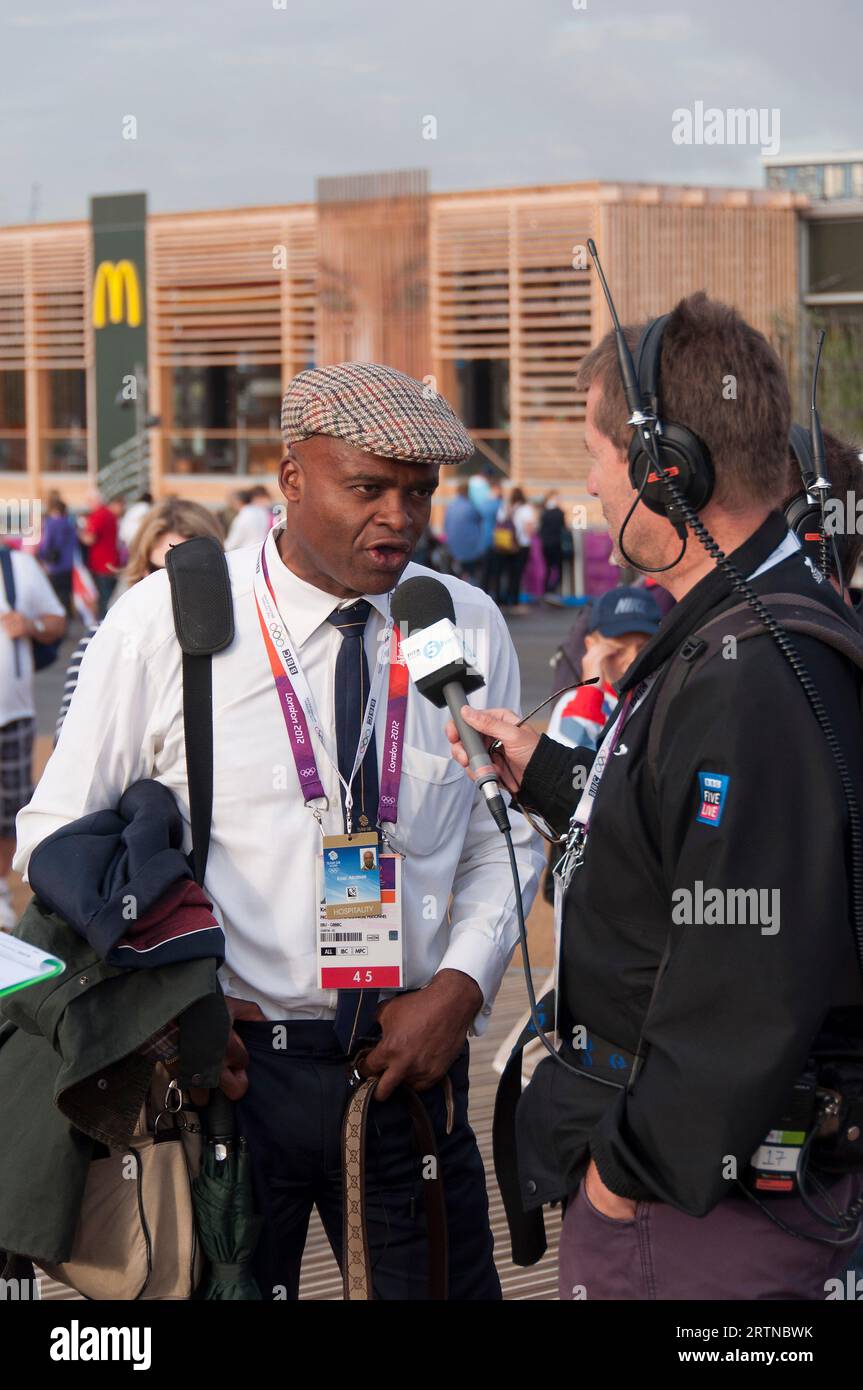 Chris Akabusi being interviewed during the London 2012 Olympics Stock ...
