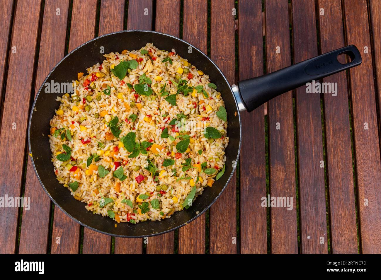 Pan of rice with vegetables Stock Photo - Alamy