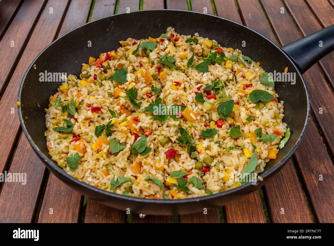 Pan of rice with vegetables Stock Photo - Alamy