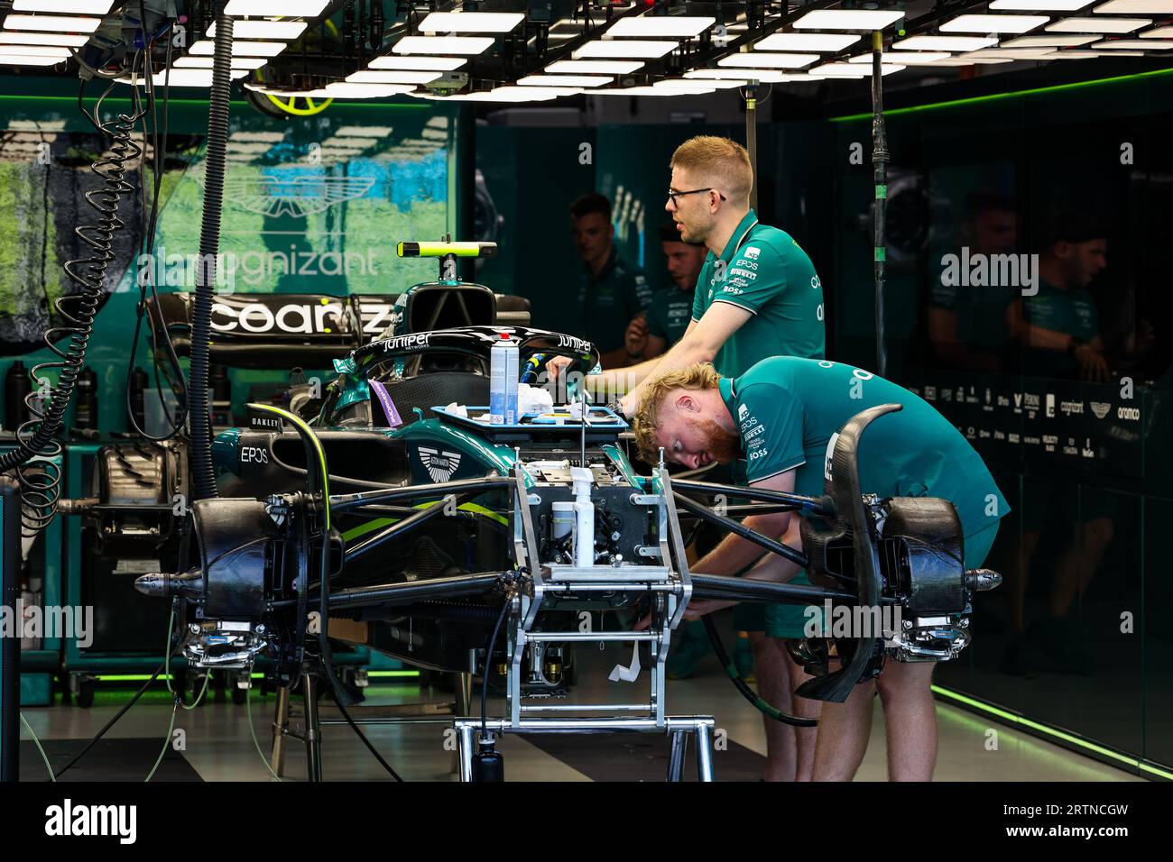 Aston Martin F1 Team AMR23, mechanical detail of mechanics working in ...