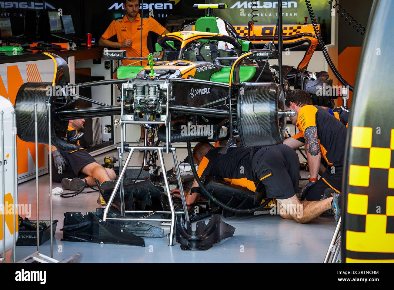 McLaren F1 Team MCL60, mechanical detail off mechanics working in the ...