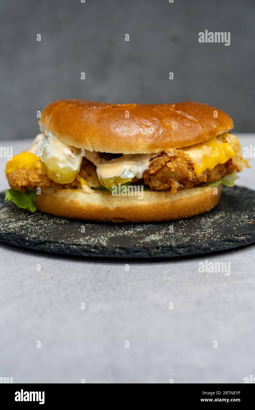 Delicious fast food burgers, MEGA Burger fries ketchup Stock Photo - Alamy