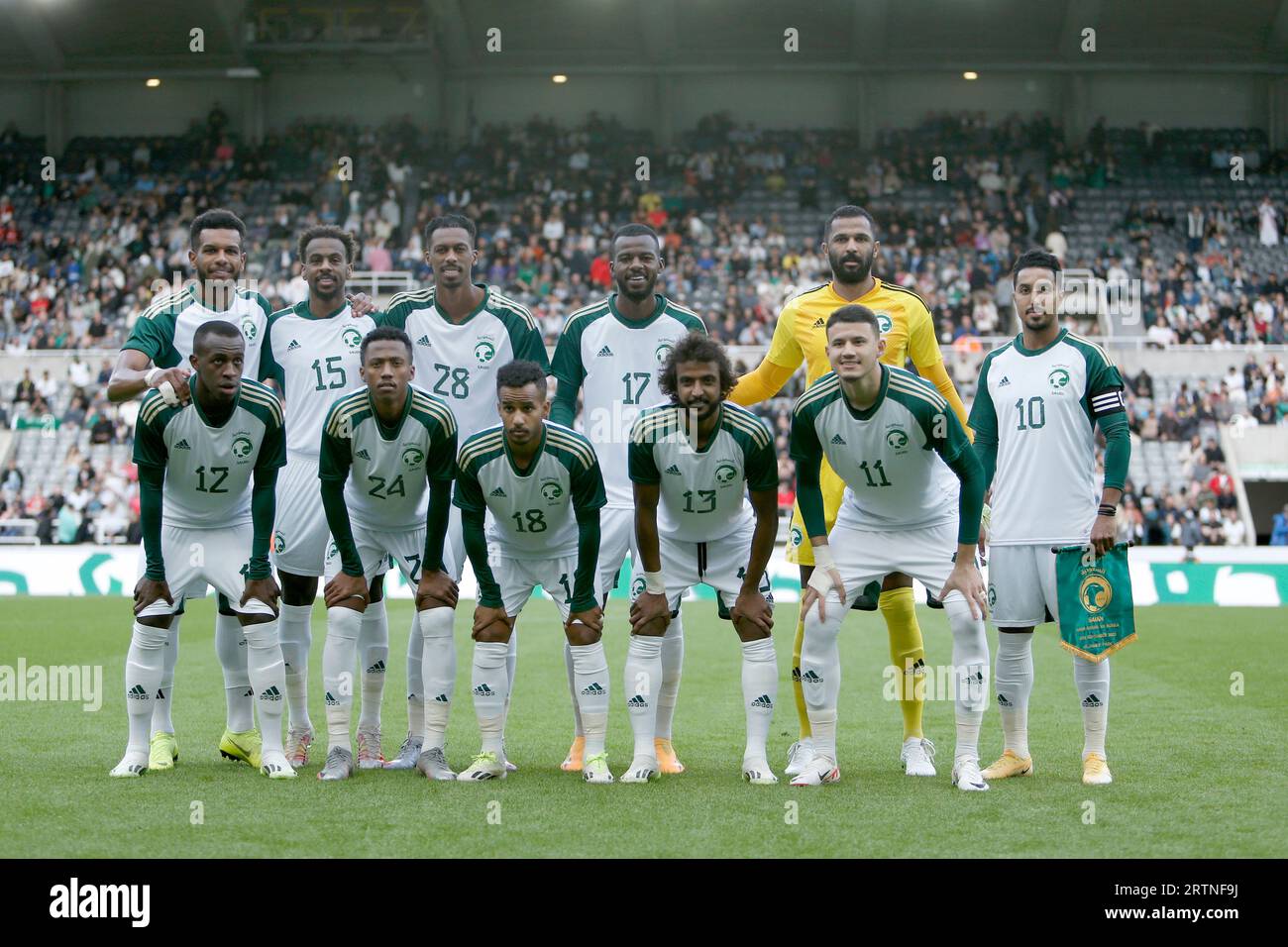 The Saudi Arabia team pose for a photo ahead of the international ...