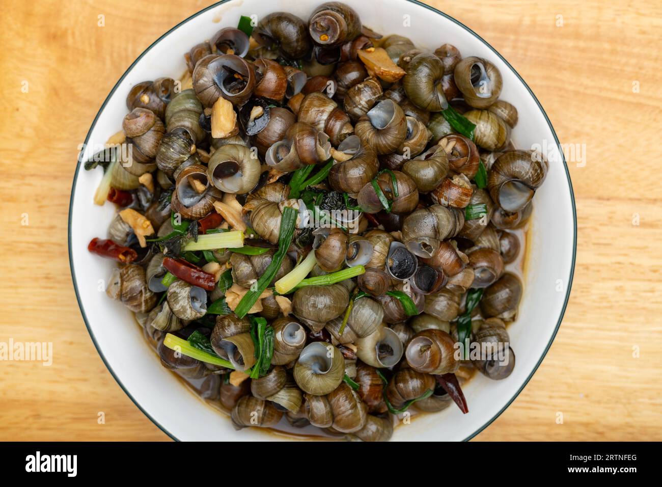 Cooked snail hi-res stock photography and images - Alamy