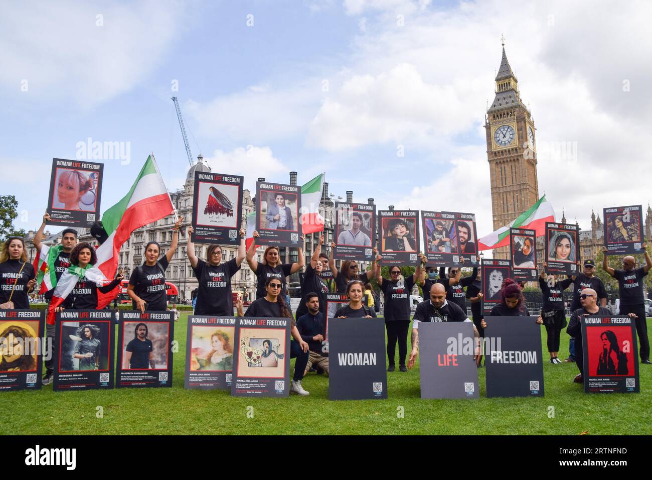 London, UK. 13th Sep, 2023. Protesters hold pictures of Mahsa Amini and ...