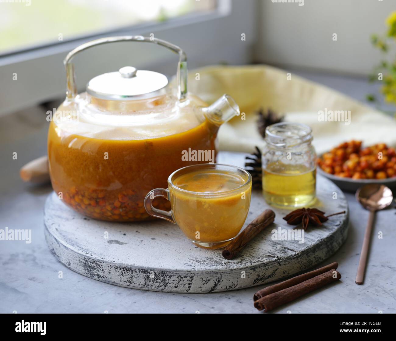 winter sea buckthorn tea with lemon and spices Stock Photo - Alamy