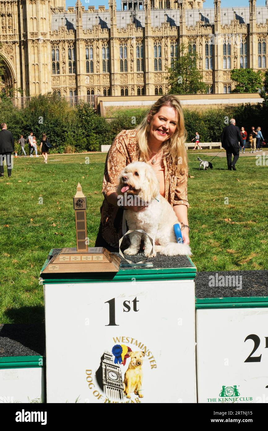 EDITORIAL USE ONLY Mims Davies wins first place with TJ, Cockapoo at ...