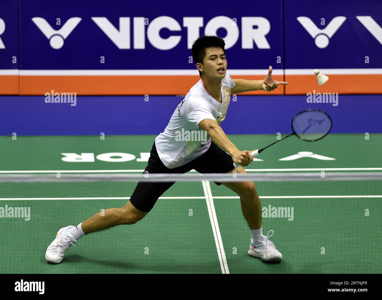 Hong Kong. 14th Sep, 2023. Lee Chia Hao of Chinese Taipei hits a return to Lee Zii Jia of ...