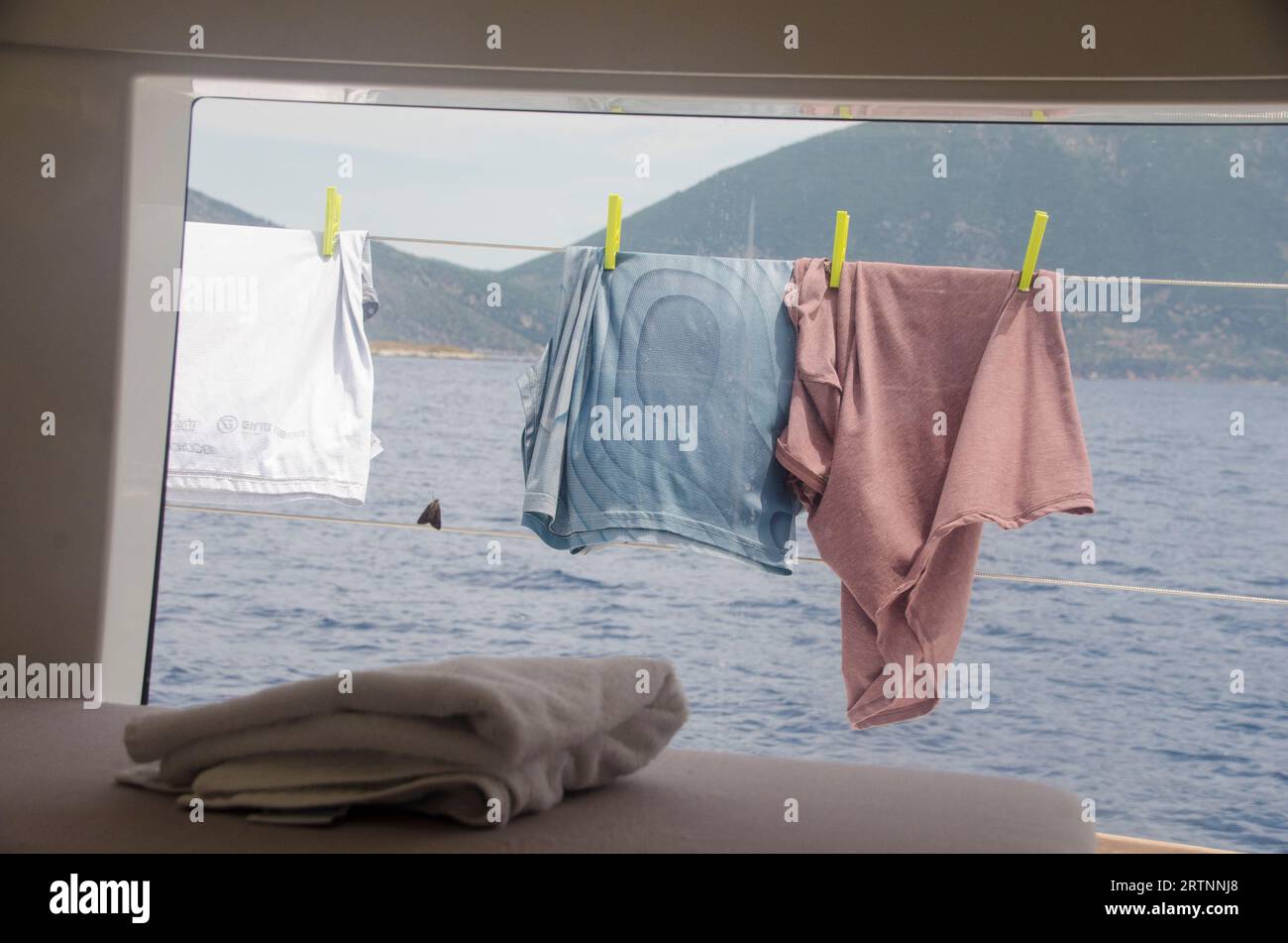 Washing drying aboard a yacht Stock Photo - Alamy