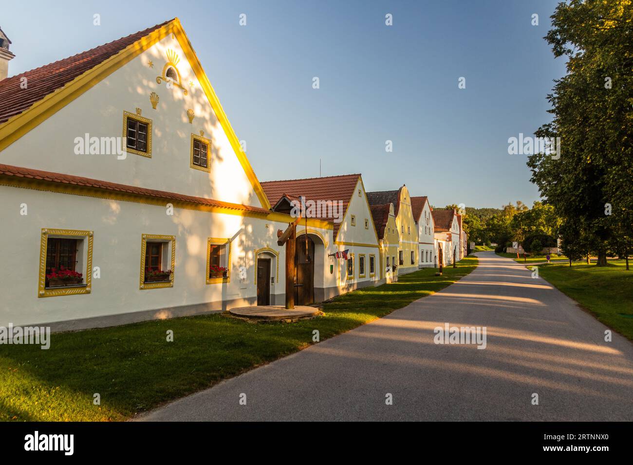 Traditional houses of rural baroque style in Holasovice village, Czech ...
