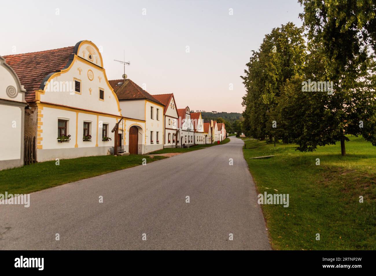 Traditional houses of rural baroque style in Holasovice village, Czech ...