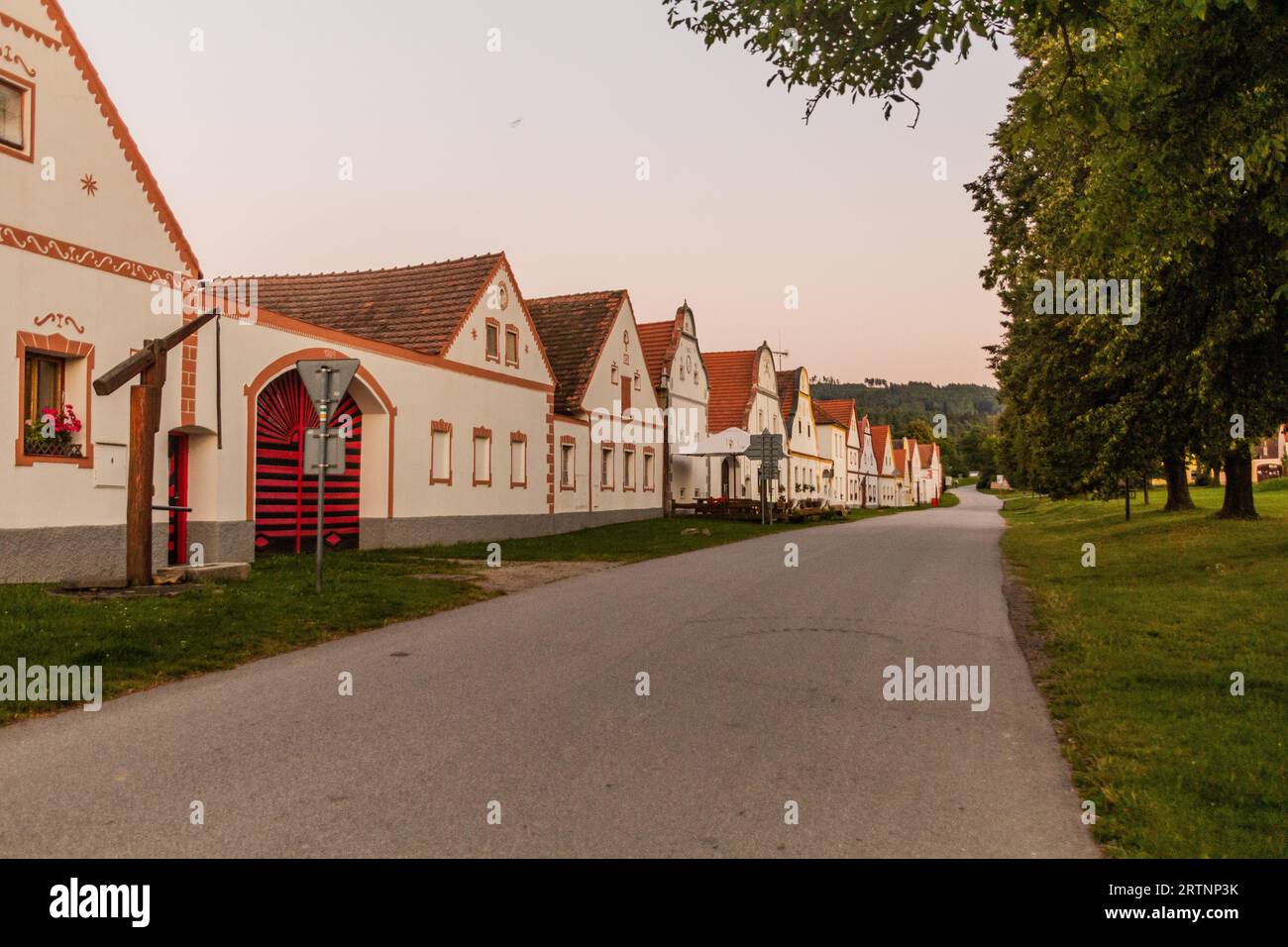 Traditional houses of rural baroque style in Holasovice village, Czech ...