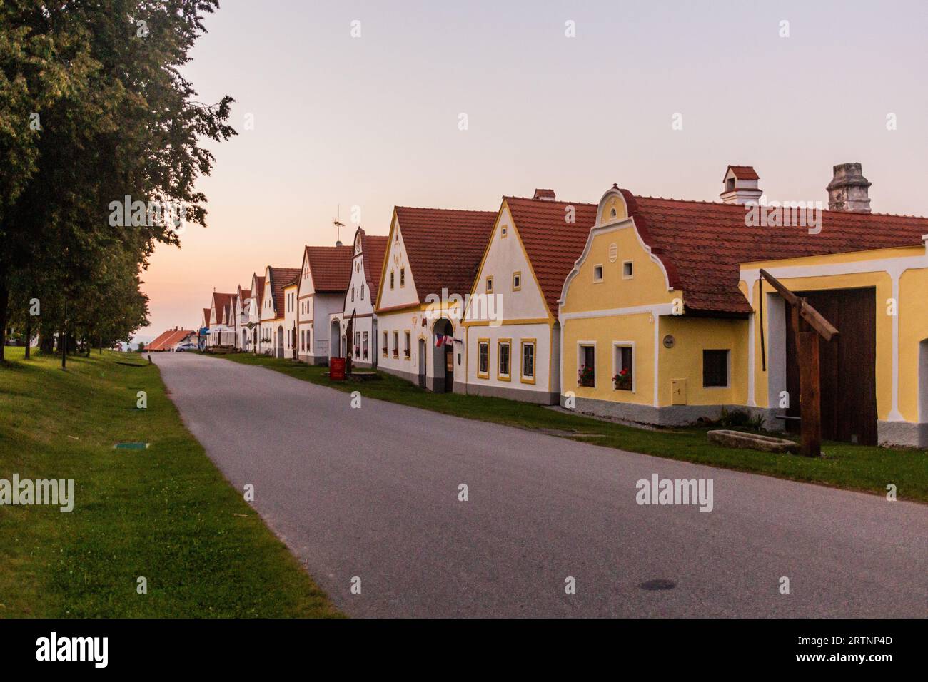 Traditional houses of rural baroque style in Holasovice village, Czech ...