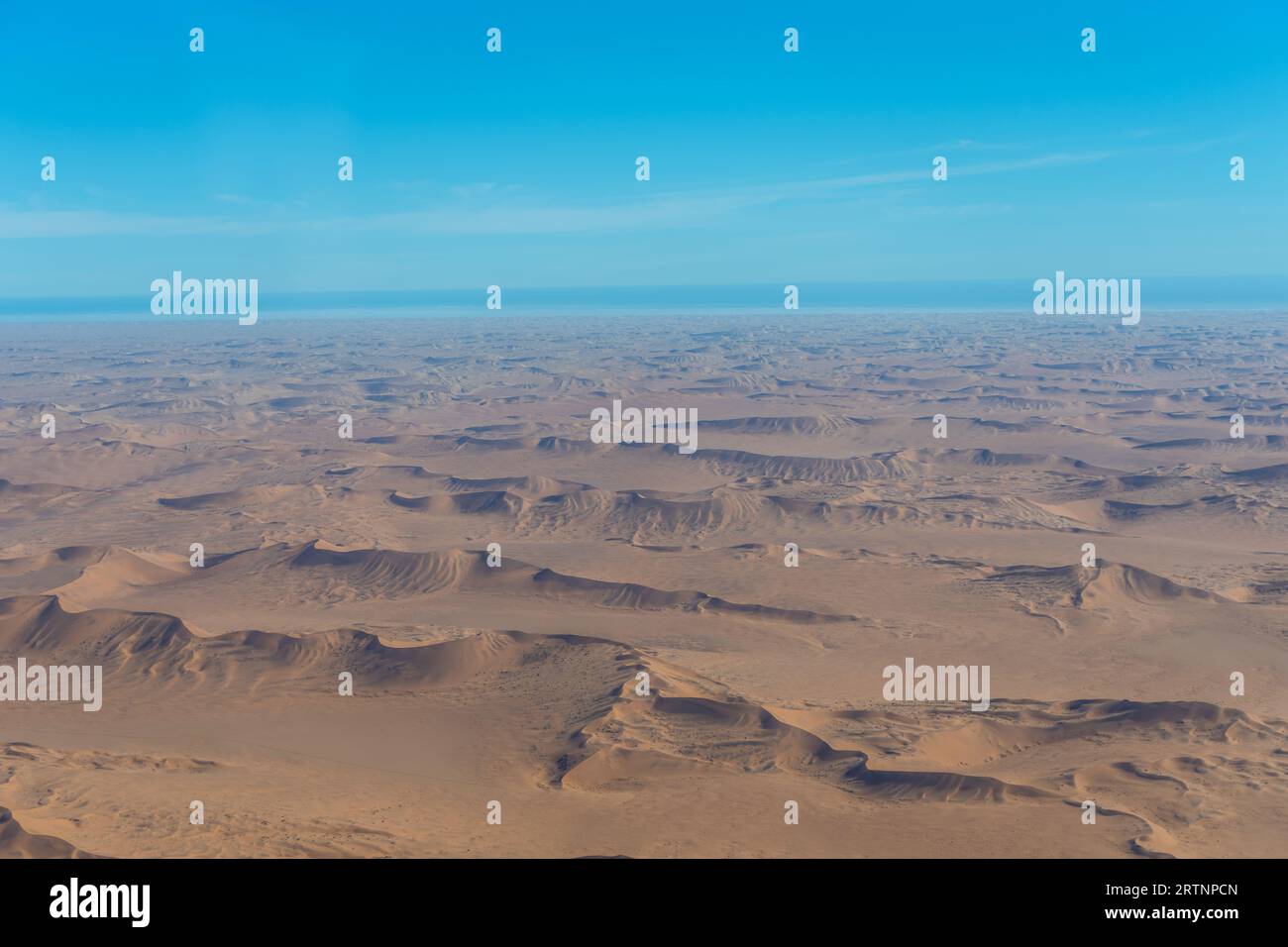 Aerial photography the Namibian coast where the sand dunes meet the ...