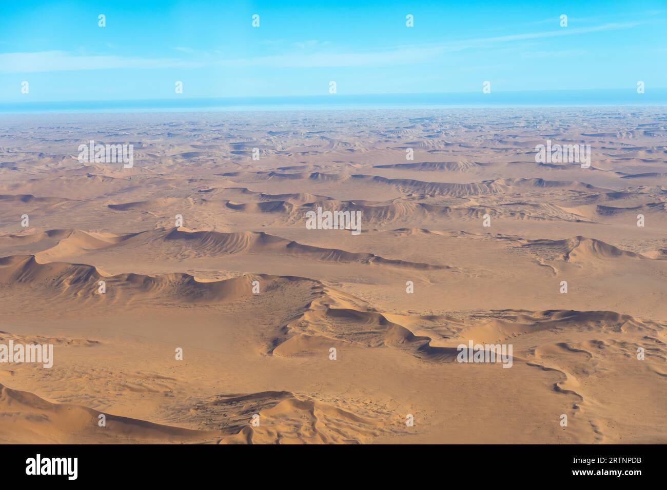 Aerial photography the Namibian coast where the sand dunes meet the ...