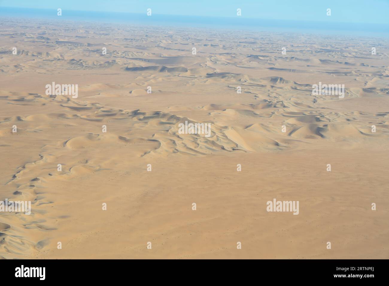 Aerial photography the Namibian coast where the sand dunes meet the ...