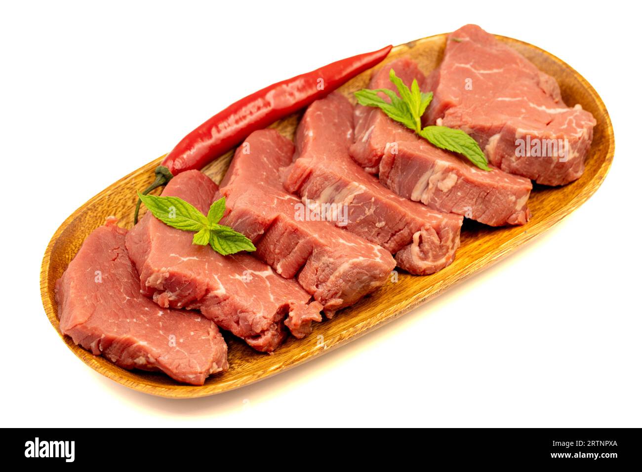 Raw beef tenderloin isolated on white background. Raw beef tenderloin ...