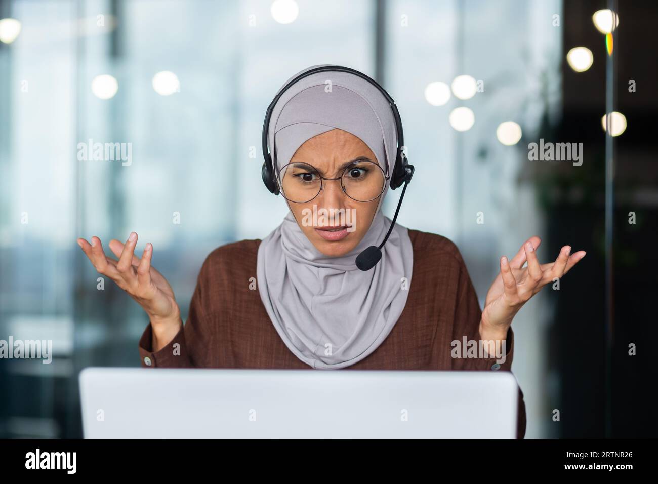 Close-up photo. Serious and strict and demanding Muslim female teacher ...
