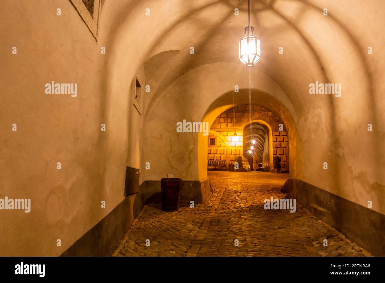 Vaulted path through a gate at Cesky Krumlov chateau, Czech Republic ...