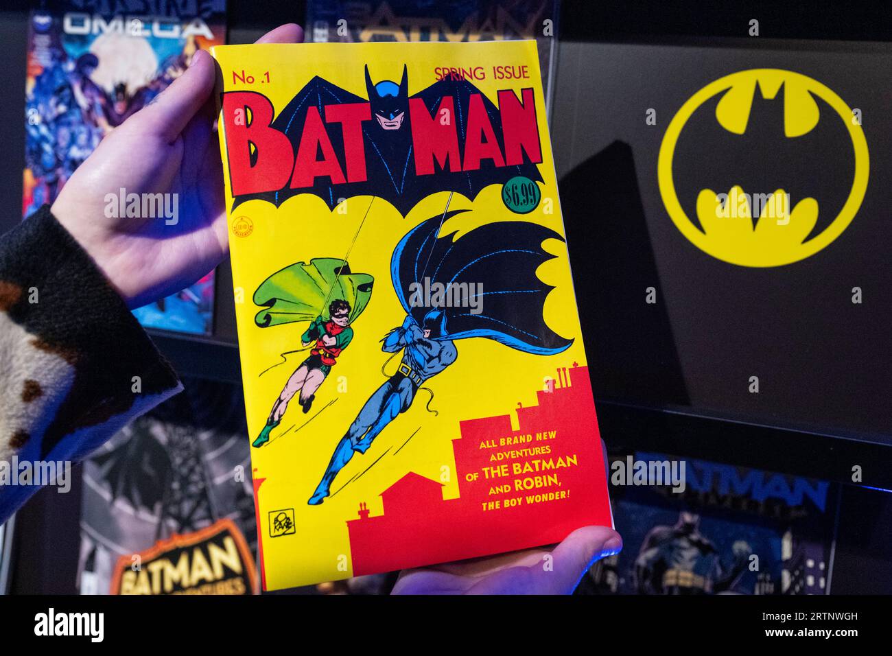 London, UK. 14 September 2023. A staff member with a copy of Bat Man ...