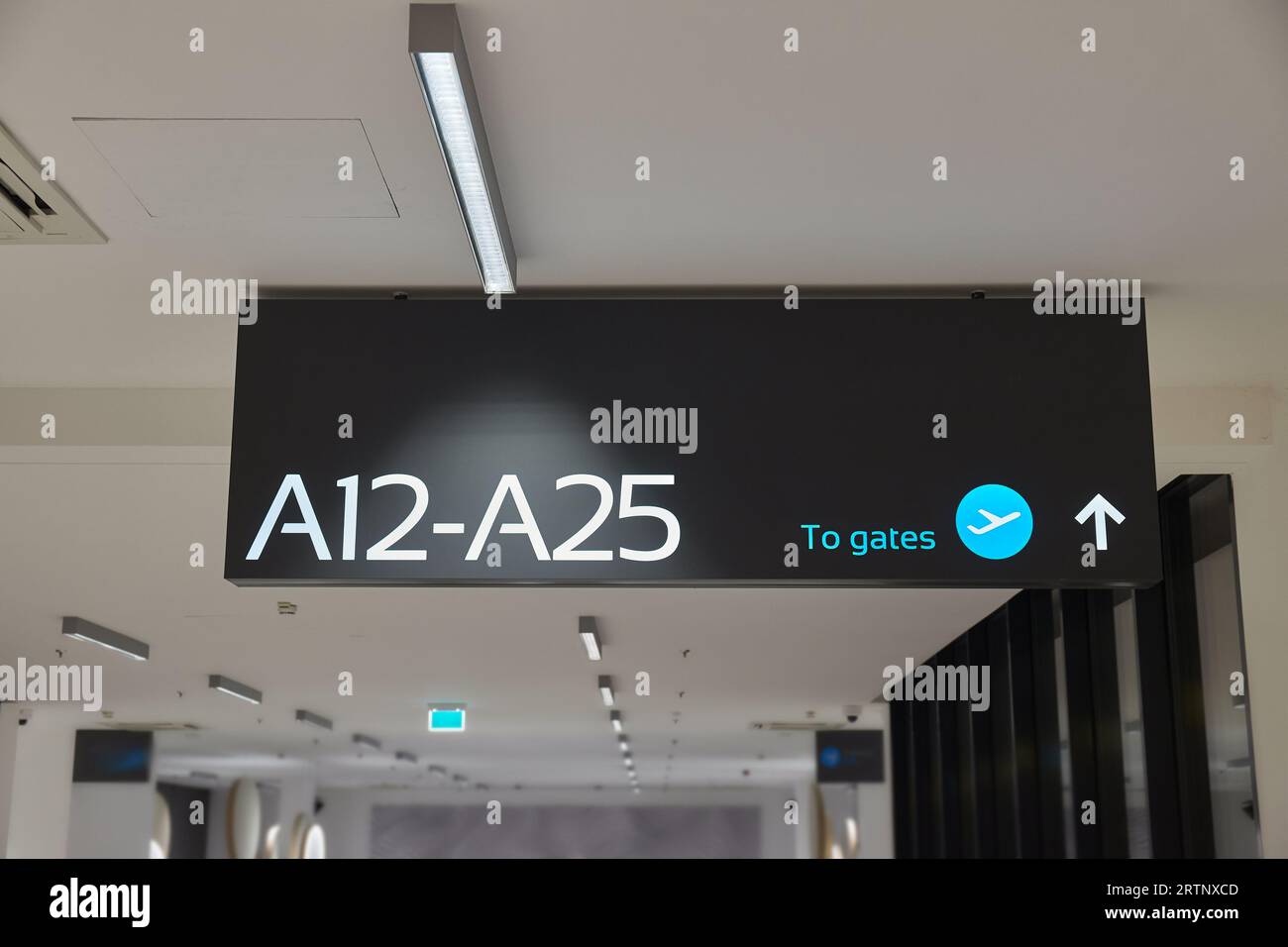 Airport terminal gates direction sign Stock Photo - Alamy