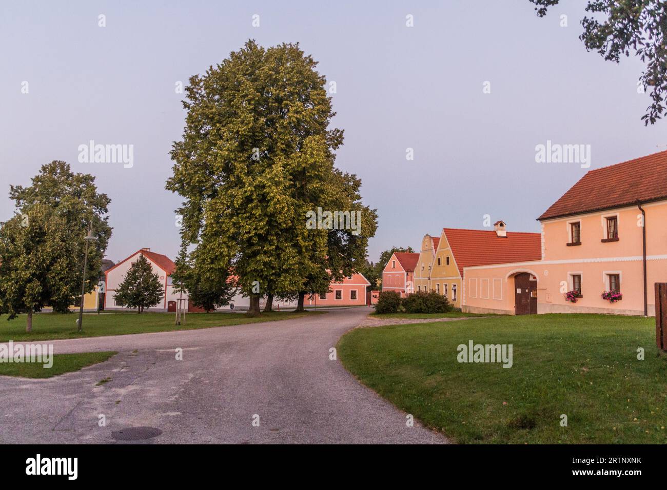 Traditional houses of rural baroque style in Holasovice village, Czech ...