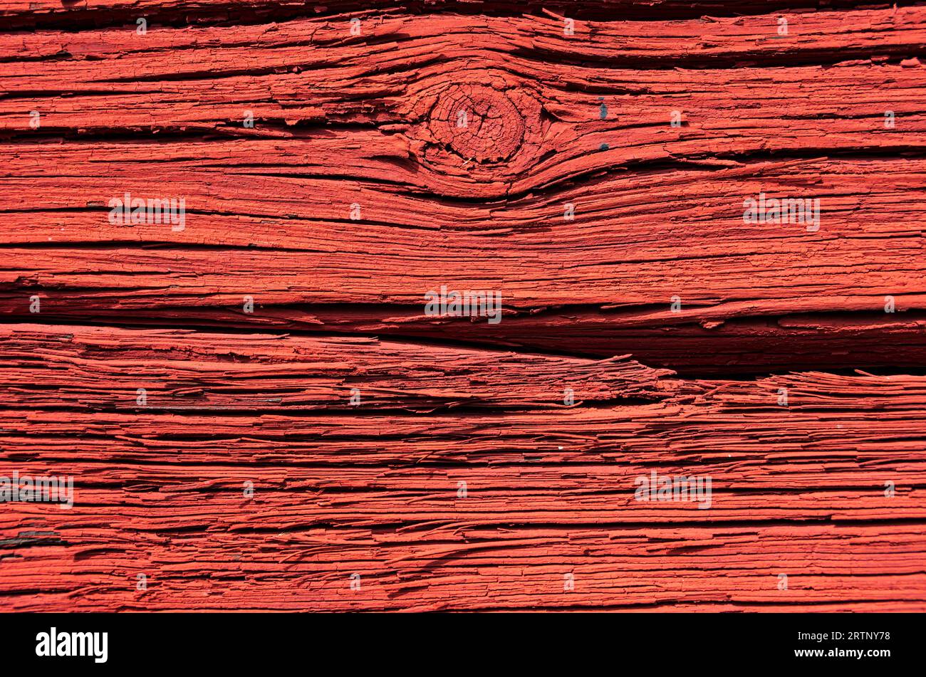 Wooden planks of a traditional rural building in Swedish red, well ...