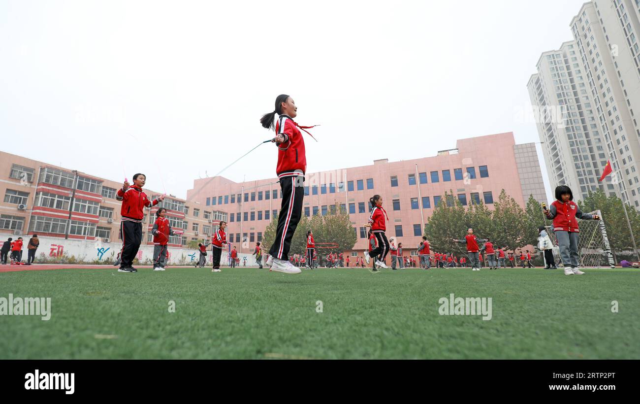Primary school students practice hi-res stock photography and images ...